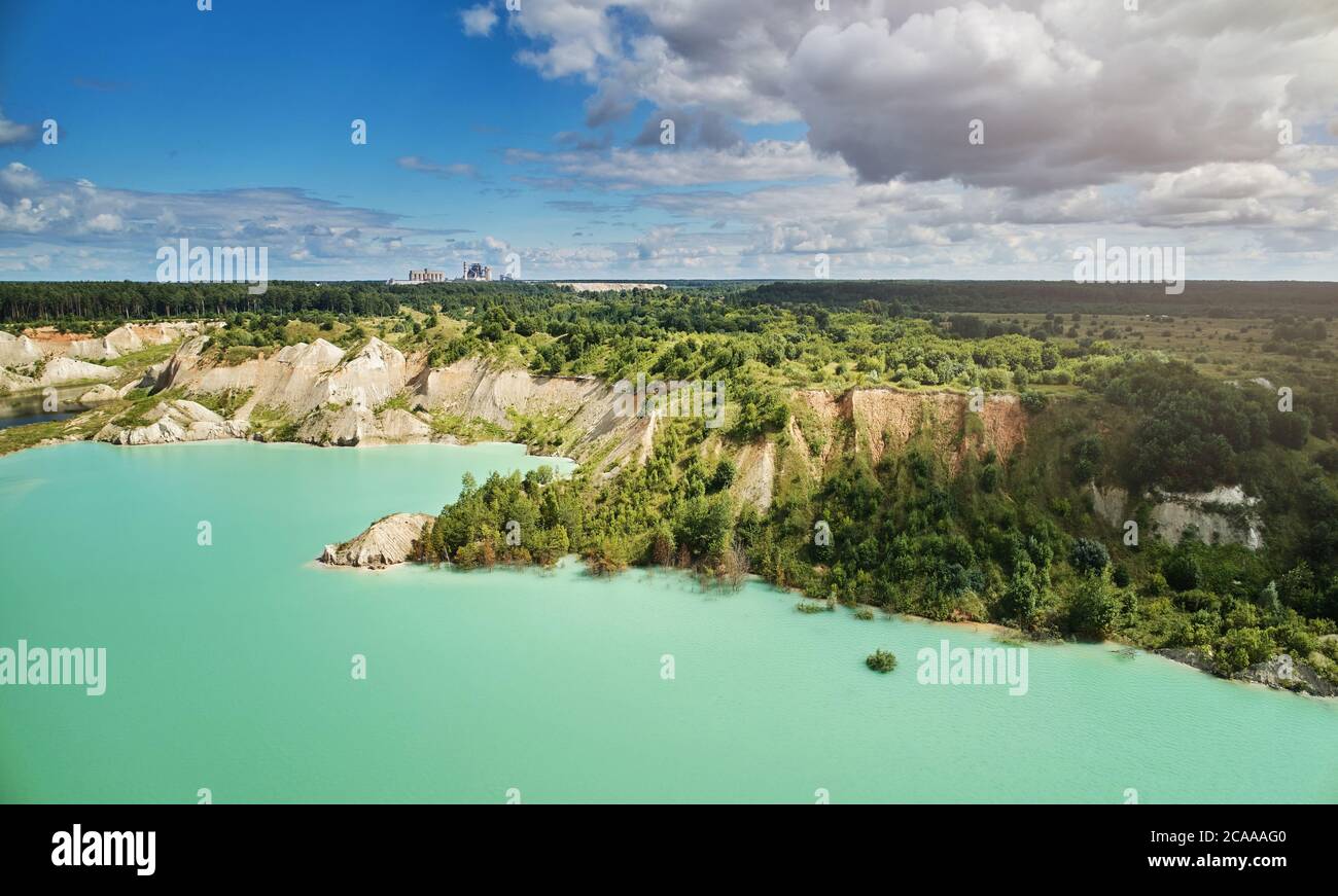Quarry next to cement factory aerial above top view Stock Photo - Alamy