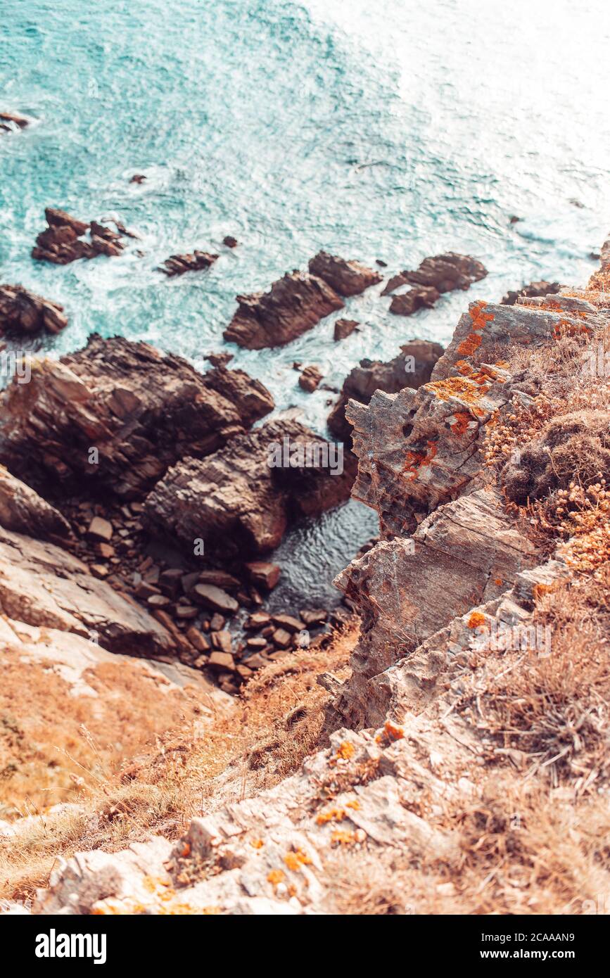 Details of rocks near the sea, on the bottom of a high cliff in Galicia ...