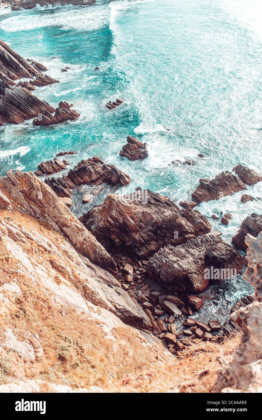 Details of rocks near the sea, on the bottom of a high cliff in Galicia ...