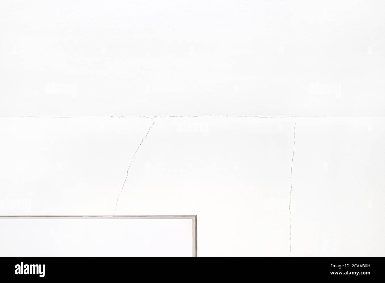 Longitudinal crack in the lintel wall above the window inside the ...