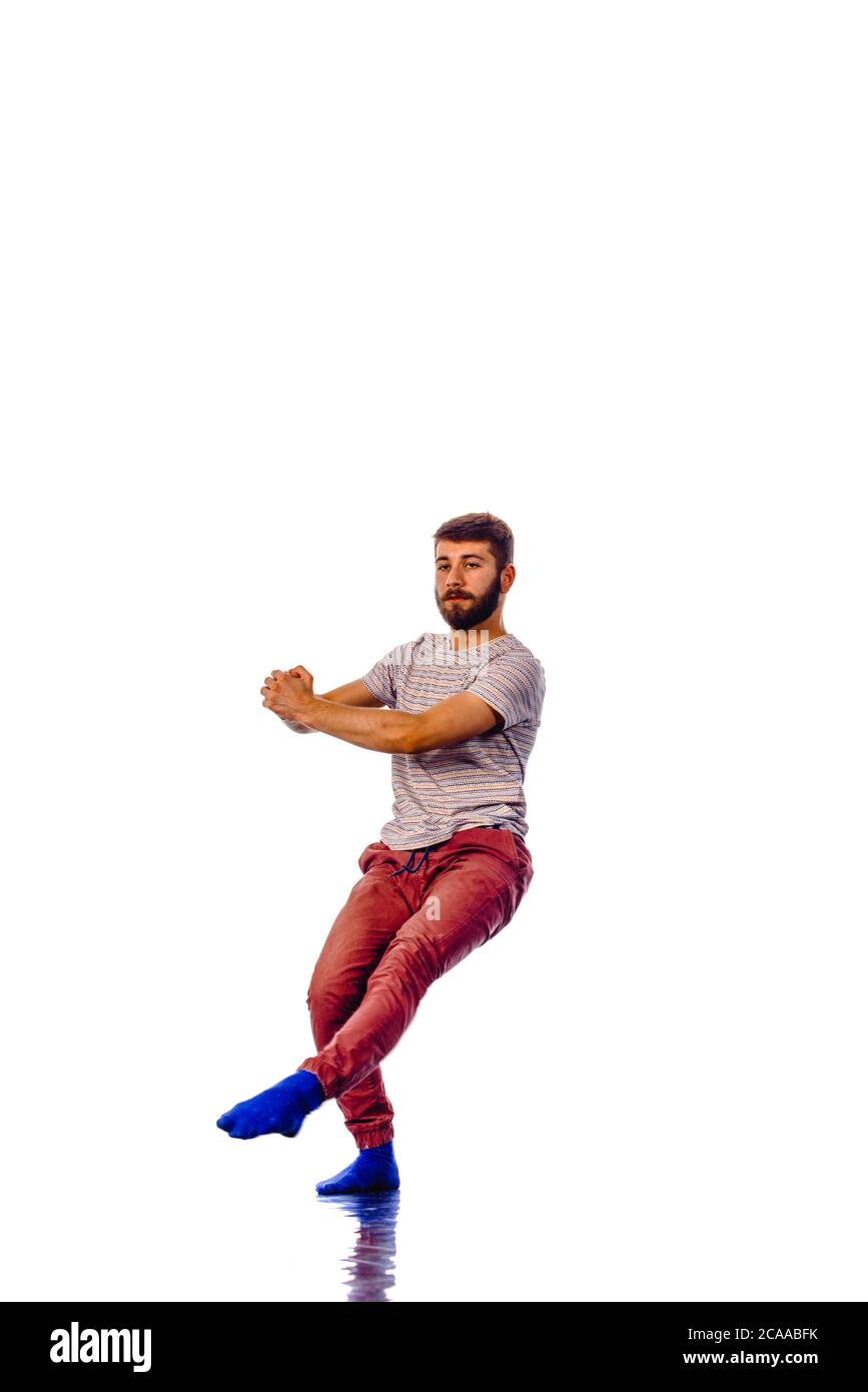 Acrobat is doing amazing dance on a white background Stock Photo - Alamy