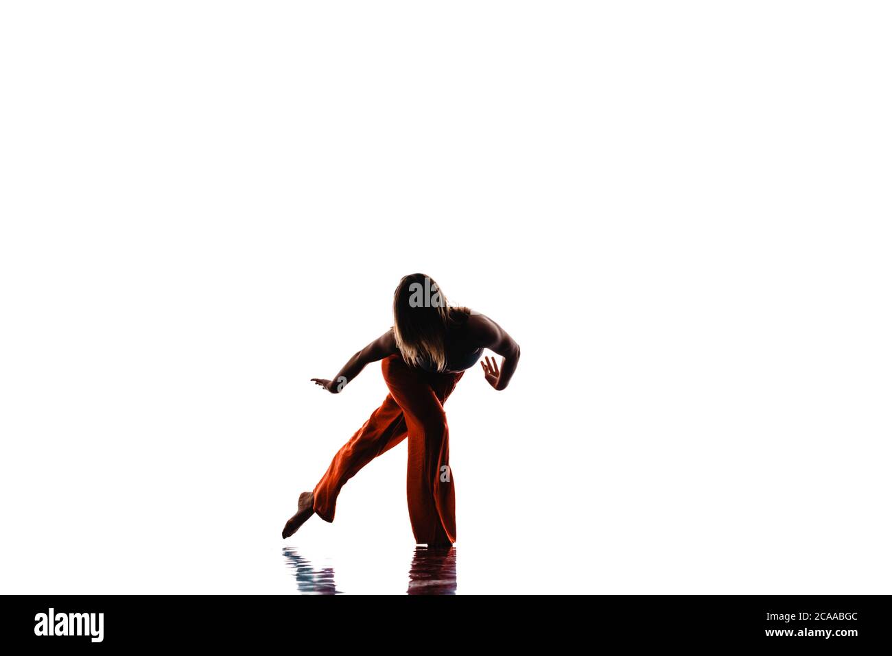 Artistic modern dancer practicing dancing moves in the studio Stock ...