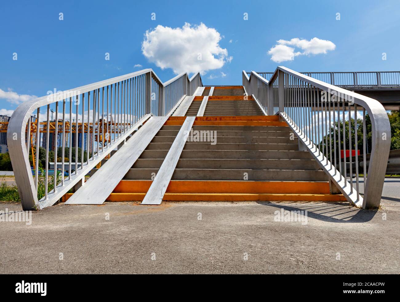 Wide entrance angle of a pedestrian crossing staircase over a highway ...