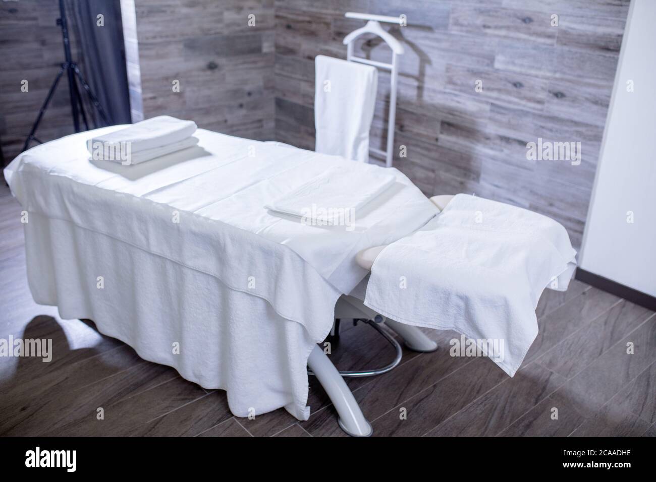 Interior of massage room in a modern spa salon. room prepared for a ...