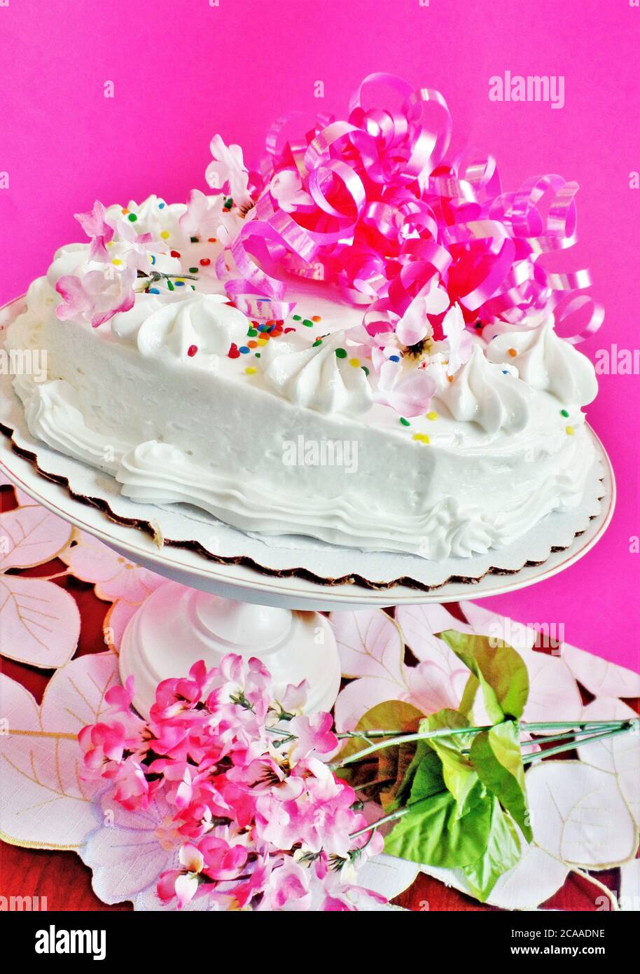 Cake decorate with pink ribbon Stock Photo - Alamy