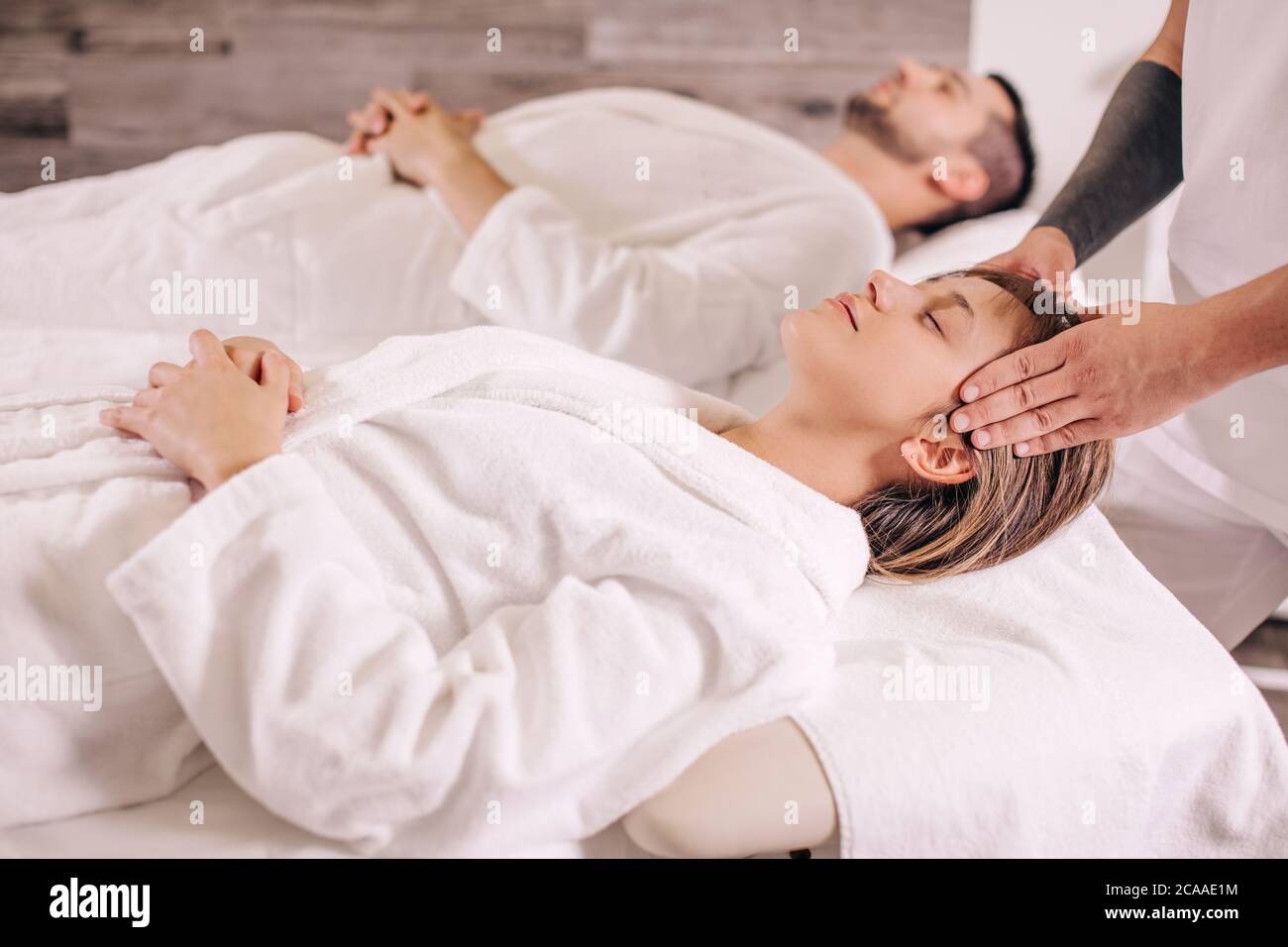 Woman massaging temples serenity hi-res stock photography and images ...