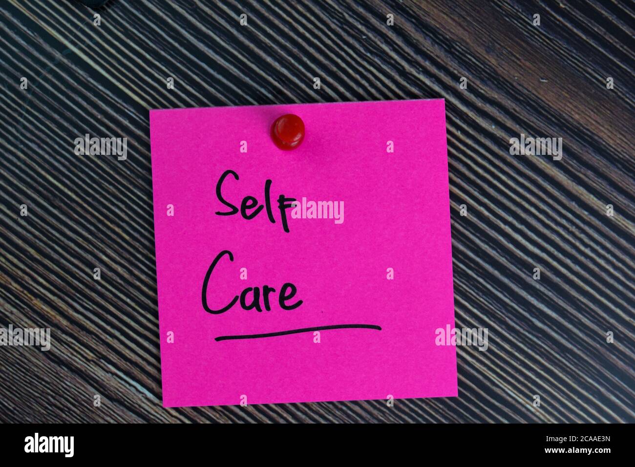 Self Care write on sticky notes isolated on office desk Stock Photo - Alamy