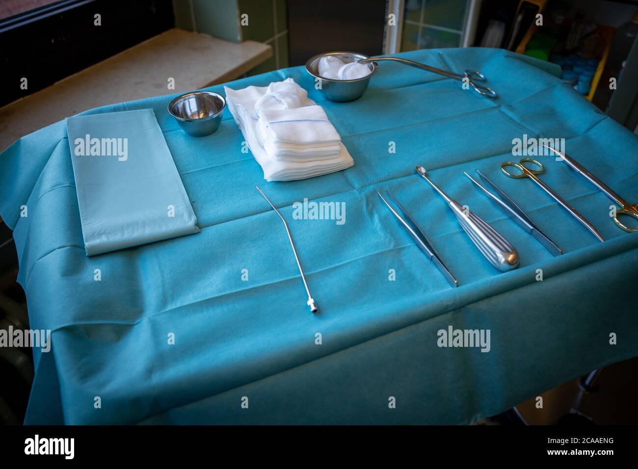 in an operating room there is an instrument table with surgical ...
