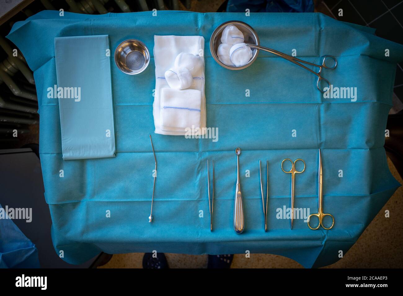 in an operating room there is an instrument table with surgical ...