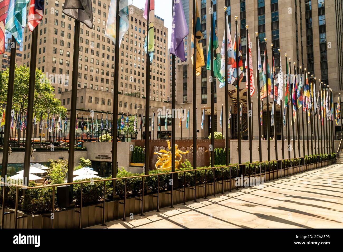 The 193 flags surrounding the rink at Rockefeller Center in New York ...