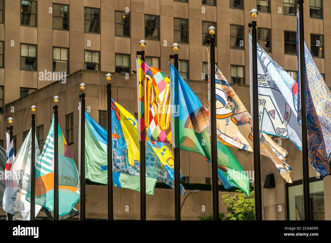The 193 flags surrounding the rink at Rockefeller Center in New York ...