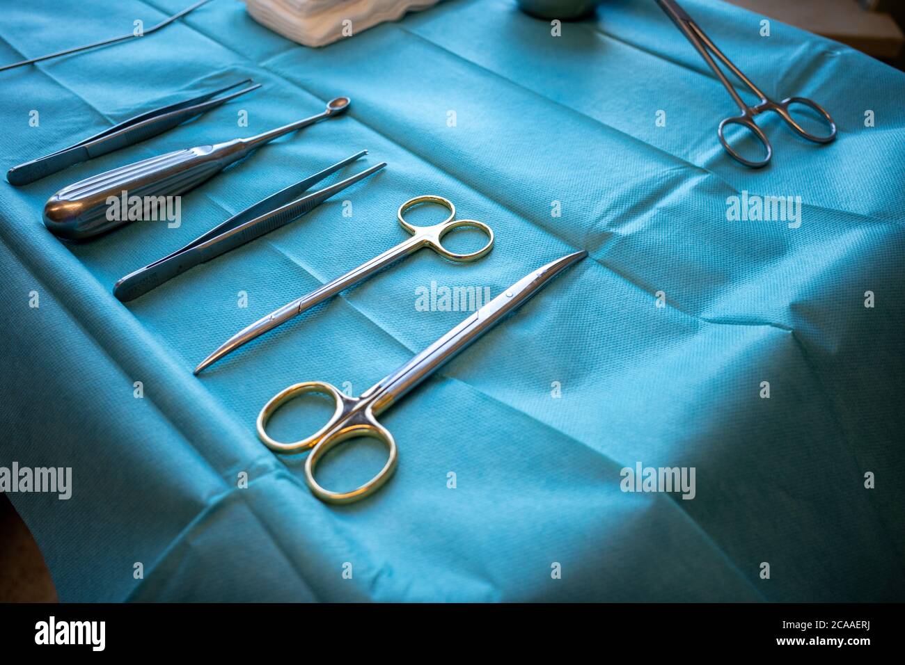 in an operating room there is an instrument table with surgical ...