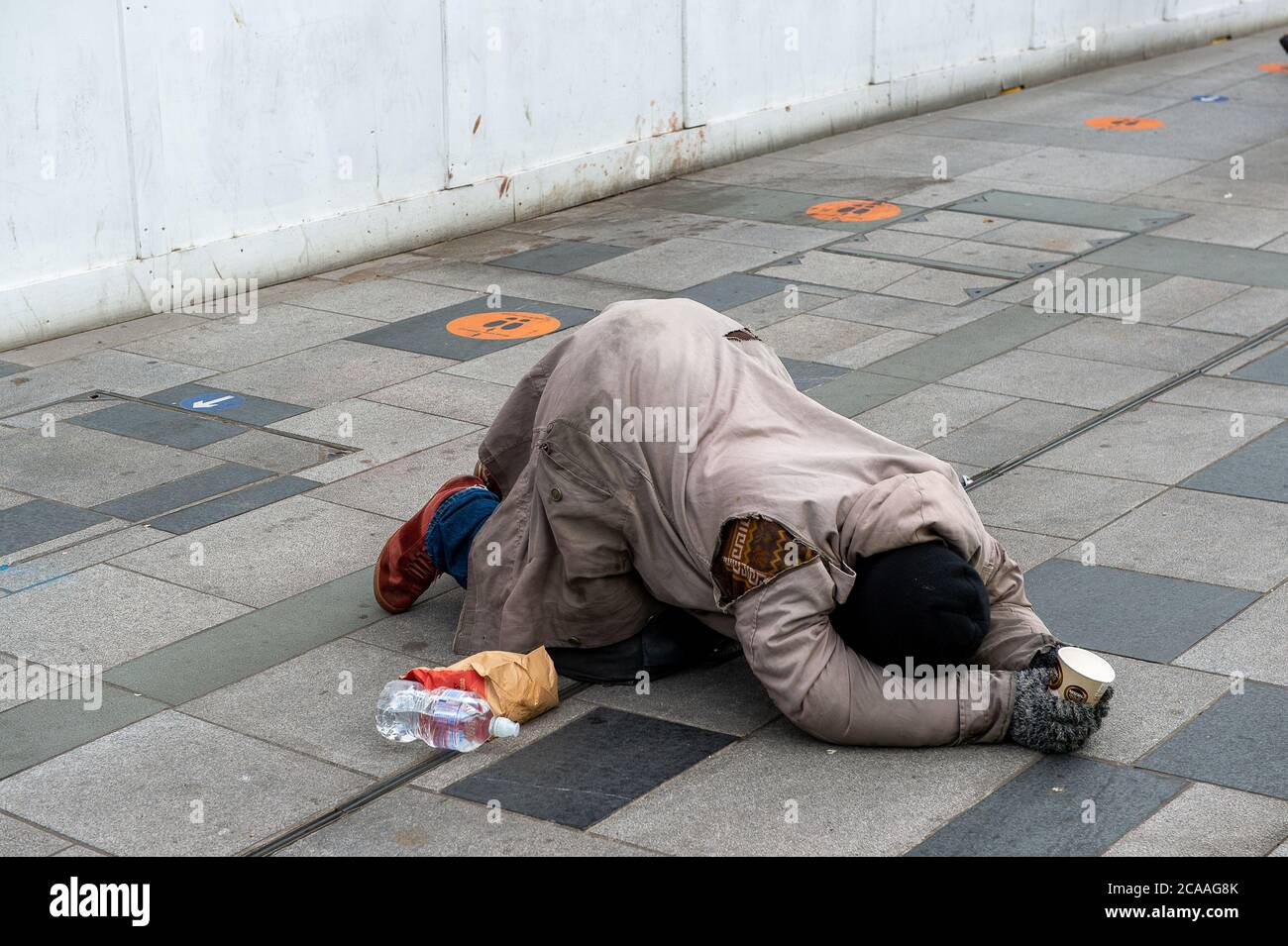 Man Kneeling Sad