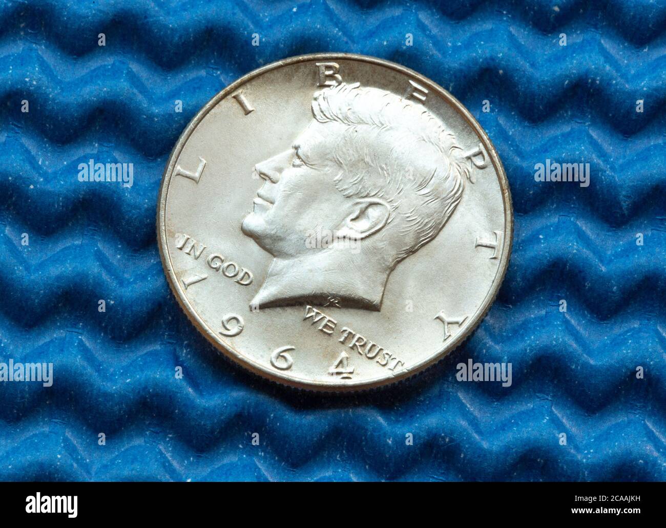 Still life of a United States historical fifty cent piece with ...