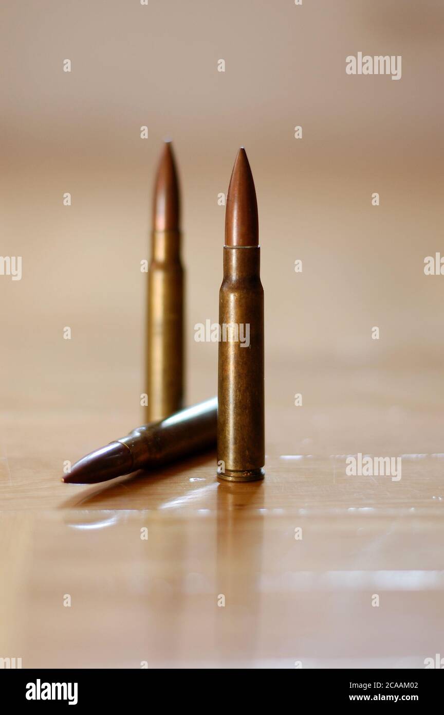 Bullets on desk Stock Photo - Alamy