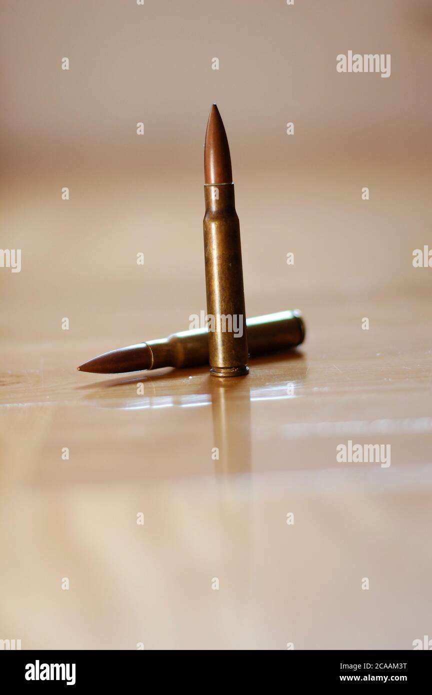 Bullets on desk Stock Photo - Alamy