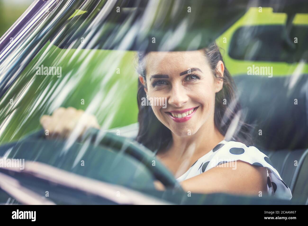 Female front seat driver hi-res stock photography and images - Alamy