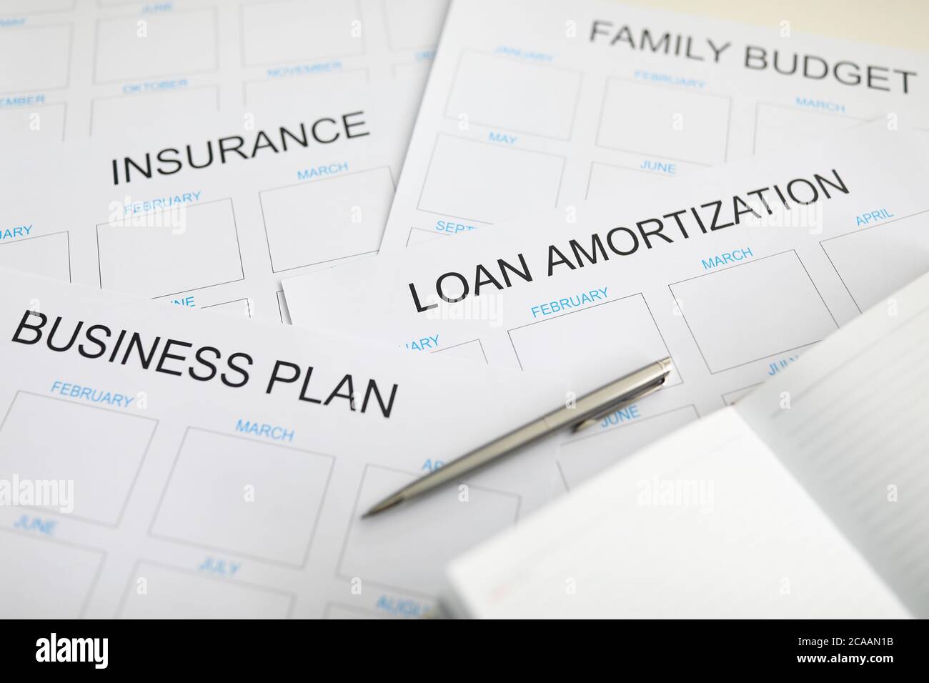 Lots of different schedule lists lying at desk ready to be filled Stock ...