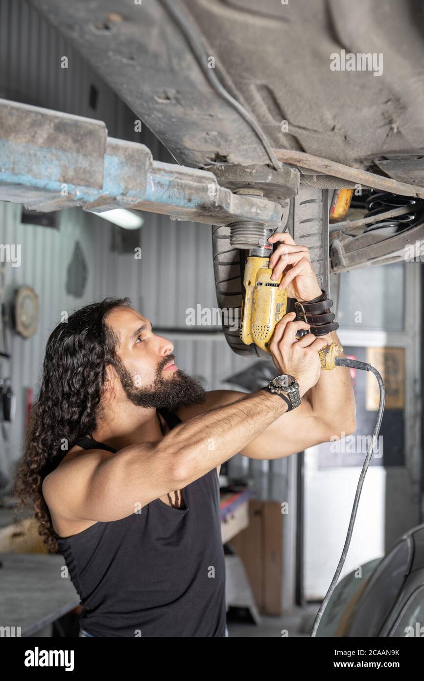 Service Station. Car tuning. Small family business concept Stock Photo ...