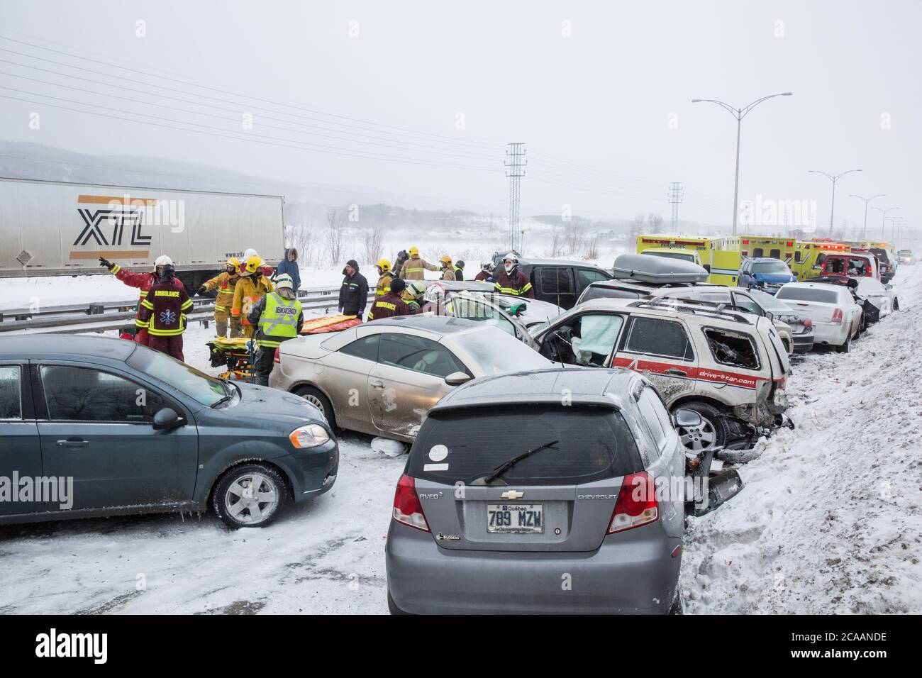 Pileup - Multi crash on road with snow storm Stock Photo - Alamy