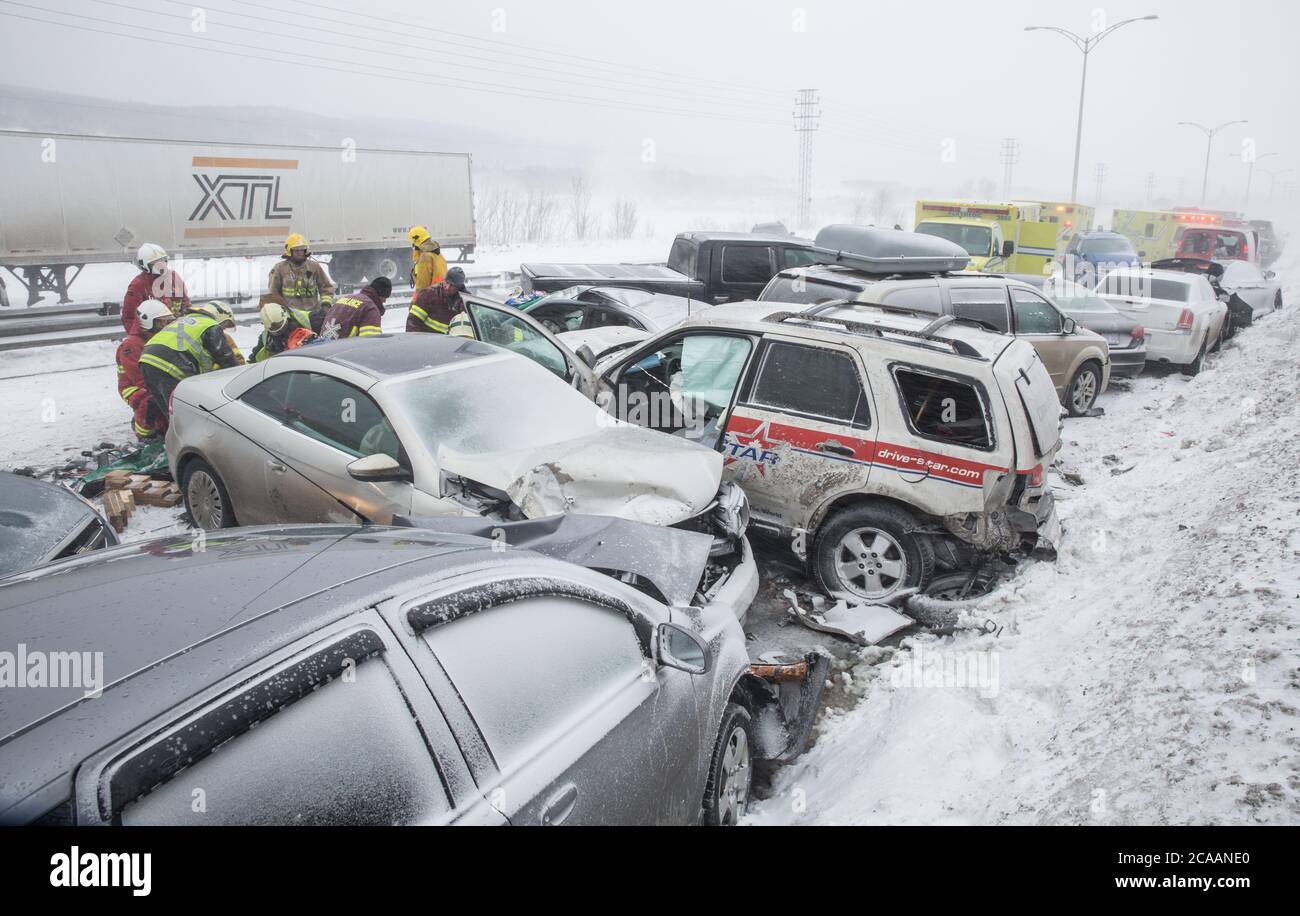 Pileup - Multi crash on road with snow storm Stock Photo - Alamy