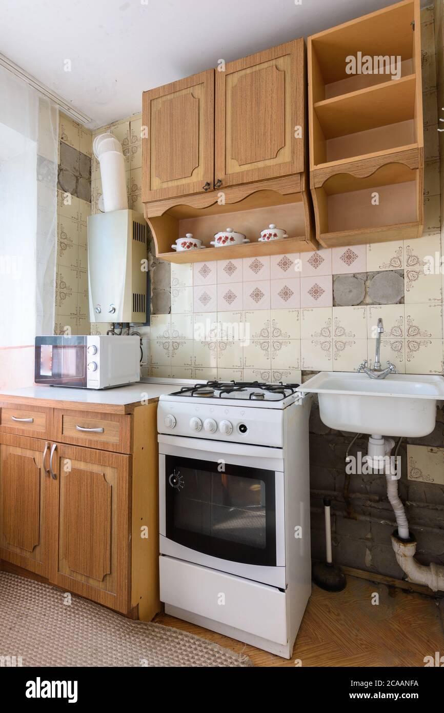 View of the old kitchen set in the interior of the kitchen in need of ...