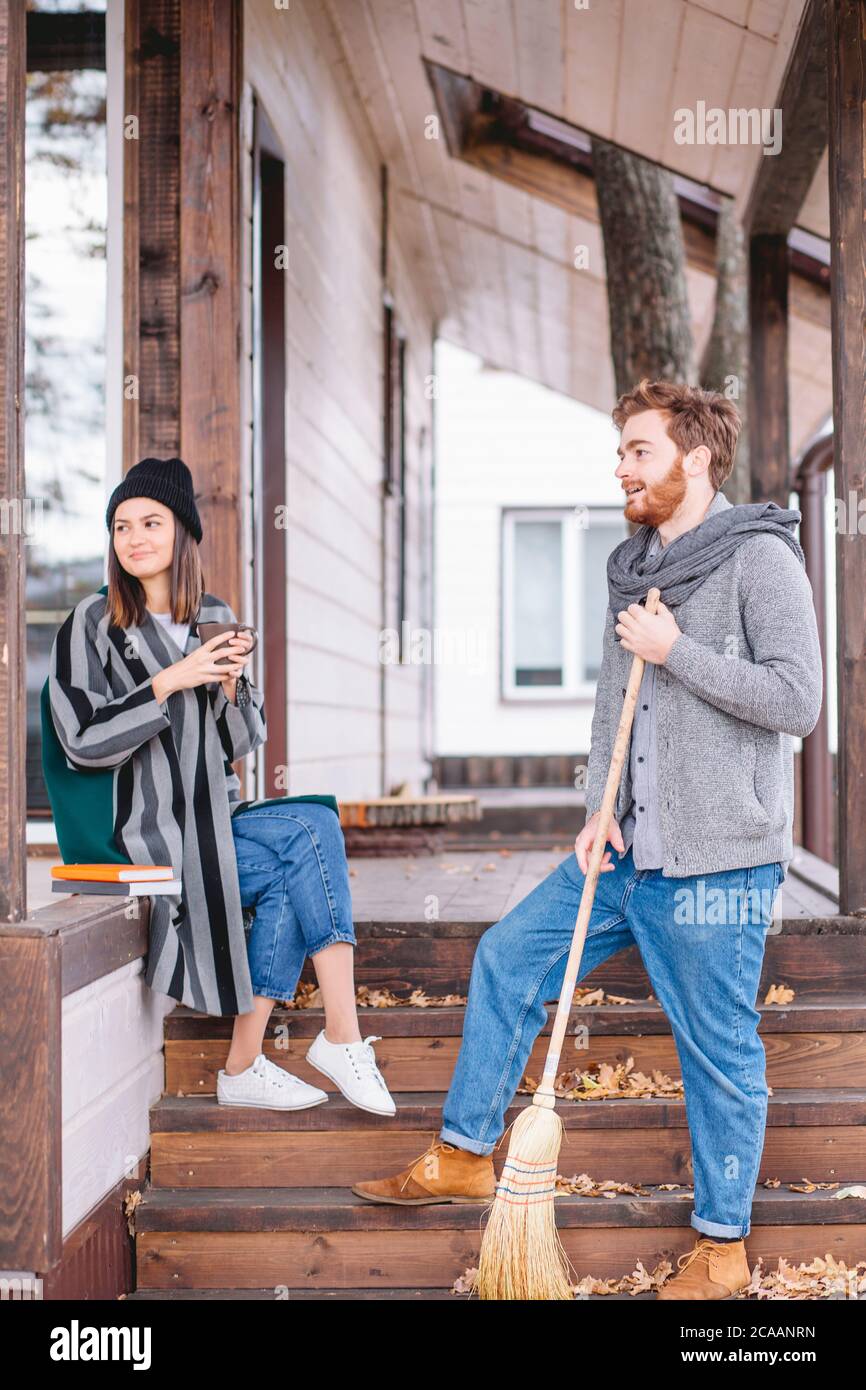 Young rich couple spend a quiet peaceful day outdoor in their country ...