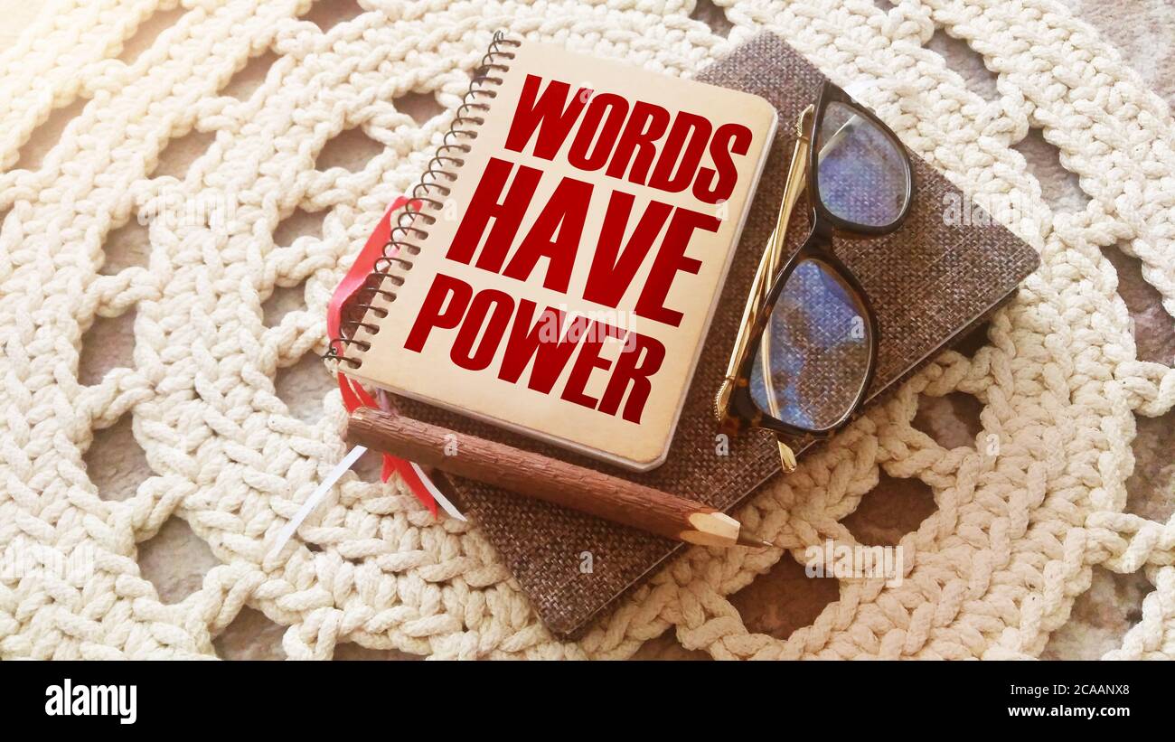 Words have power text on notebook, glasses, pen. storytelling concept ...