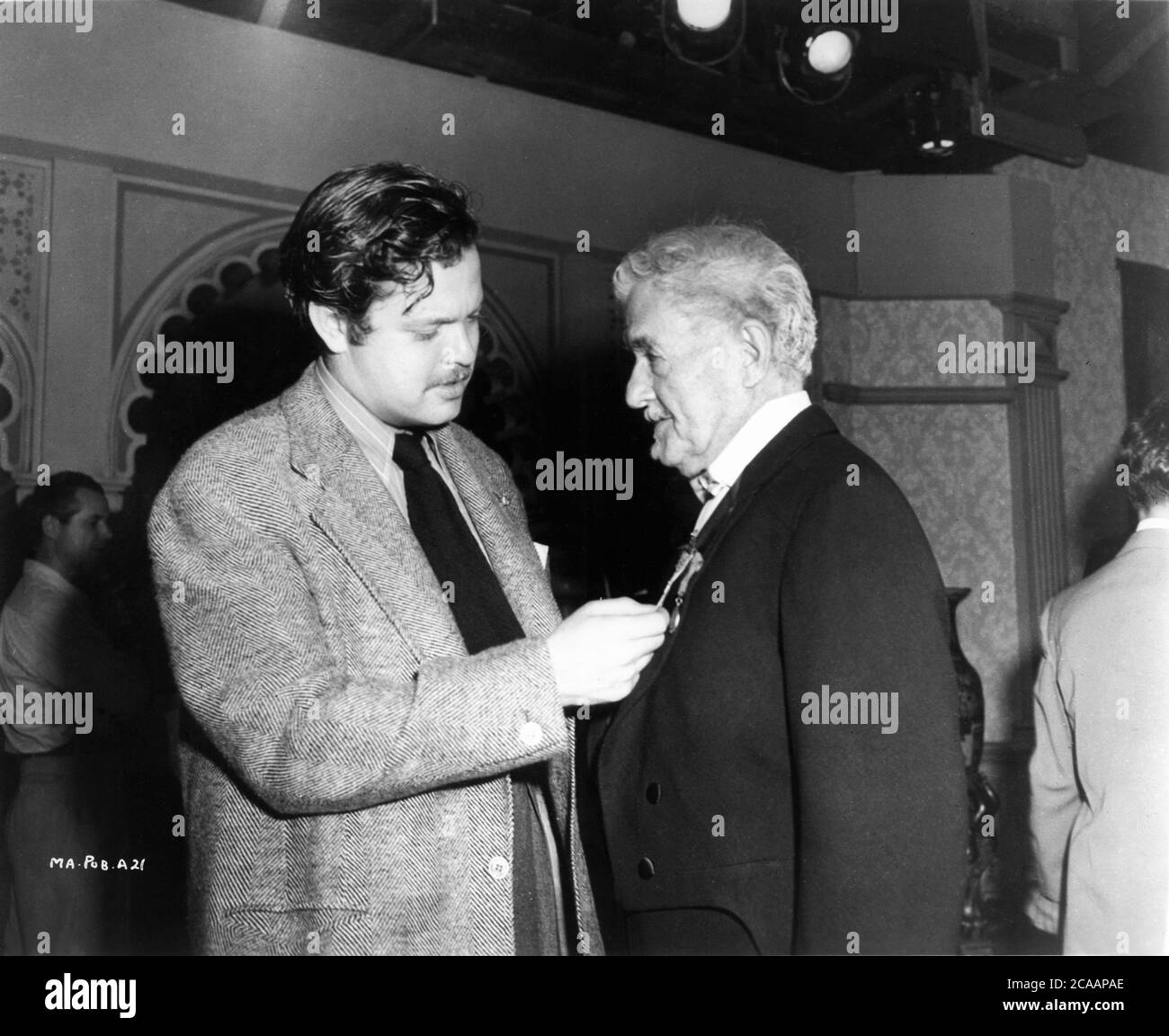 ORSON WELLES and RICHARD BENNETT on set candid during filming of THE ...