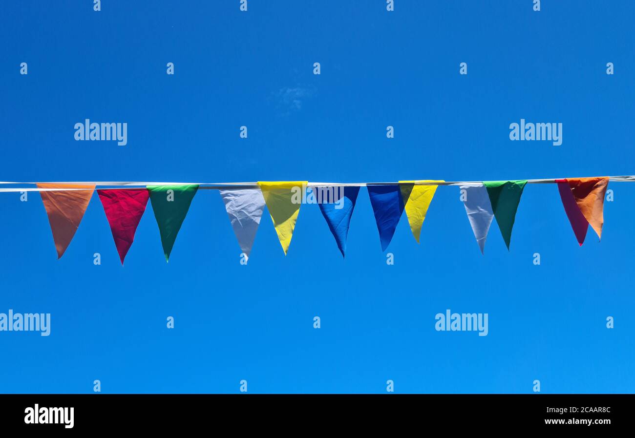 Colourful Triangle Bunting Flags Stock Photo - Alamy