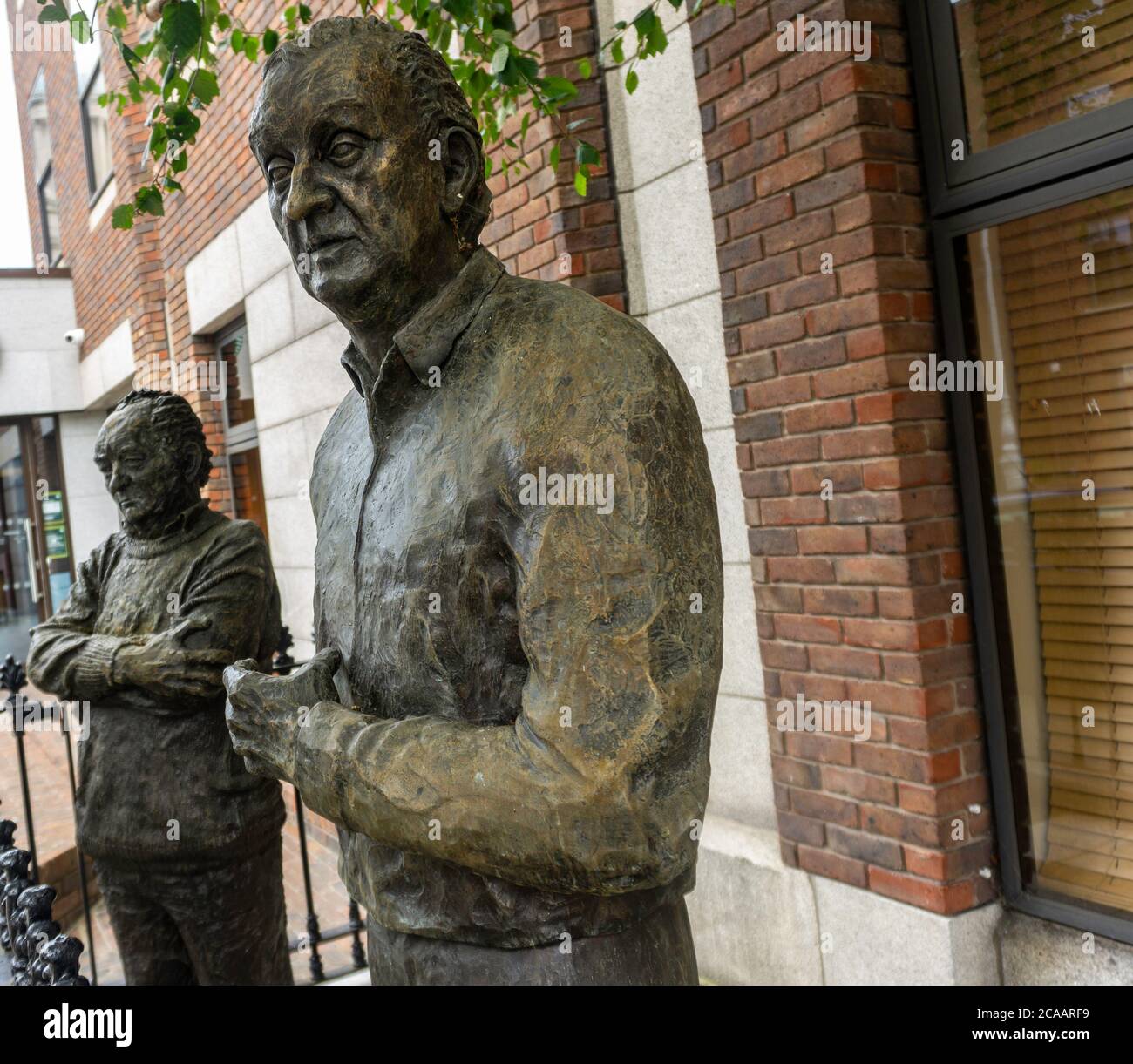 The bronze statues of two famous Irish playwrights, John B. Keane and ...