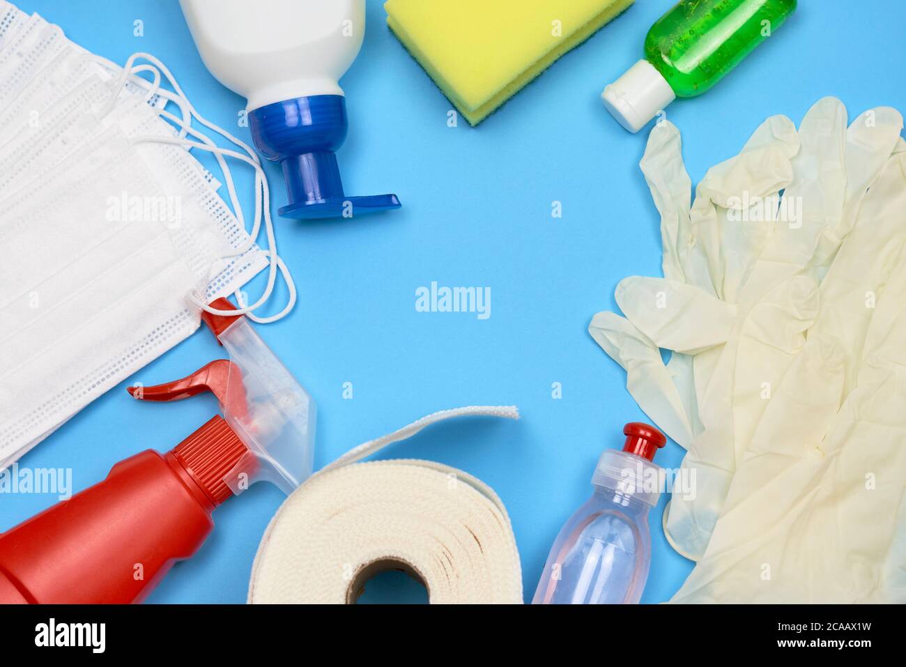 Personal hygiene products on the blue background - face masks ...