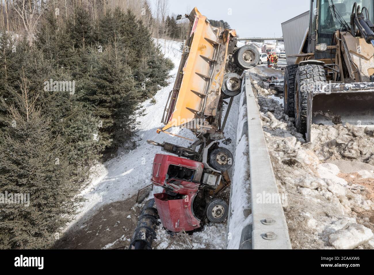 Snow truck falls off overpass Stock Photo - Alamy