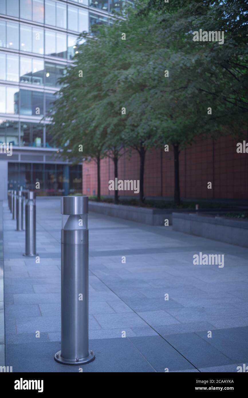 Metal bollard on walkway on pedestrianised area in the city Stock Photo ...