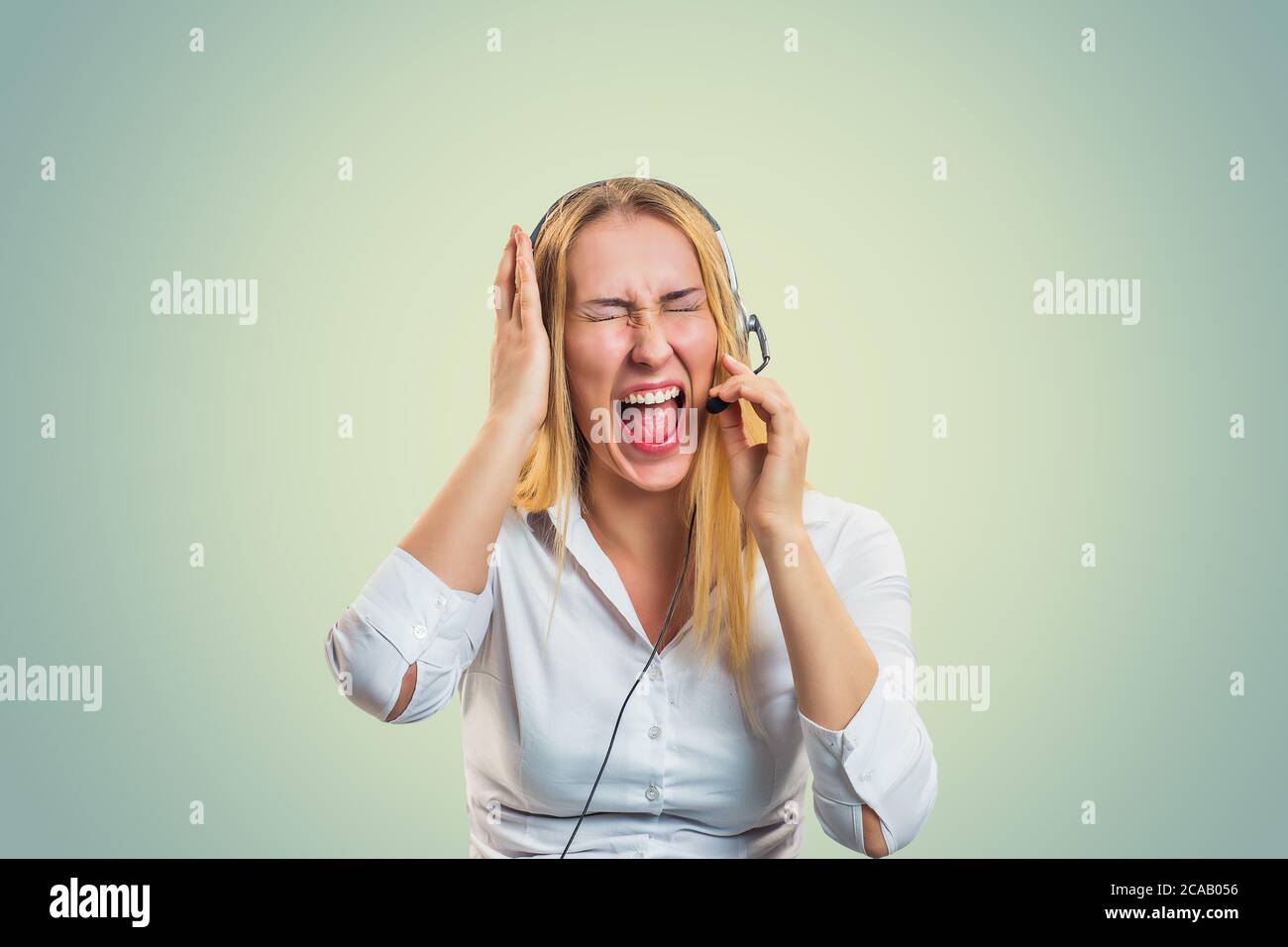 Annoyed call center agent headset hi-res stock photography and images ...