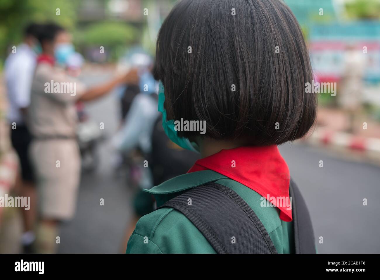 Uniform student in protective face masks standing at the school Stock ...