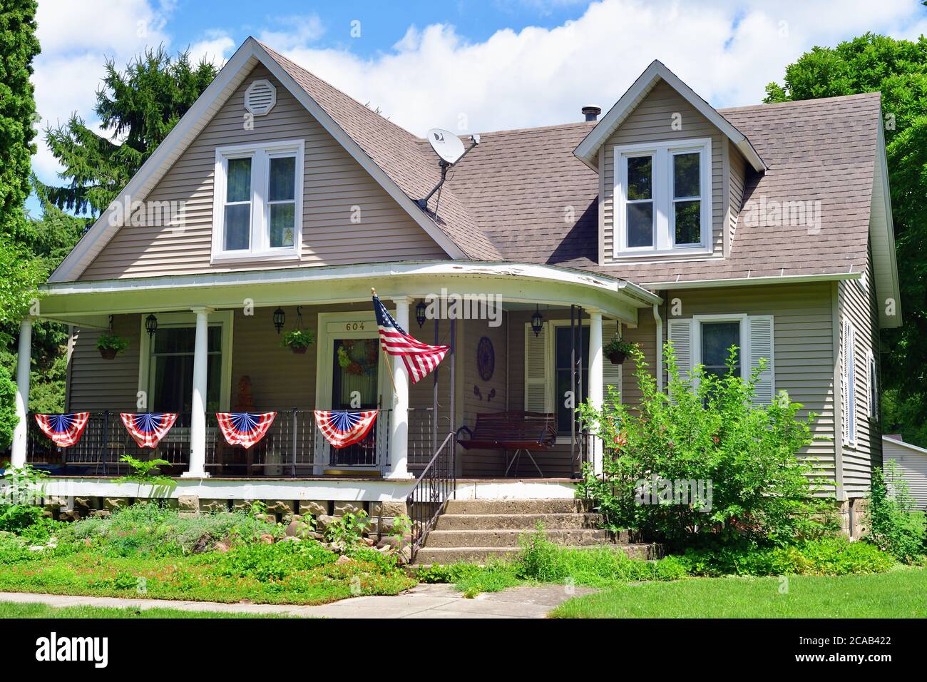 Mazon, Illinois, USA. A home decorated for the Fourth of July holiday ...