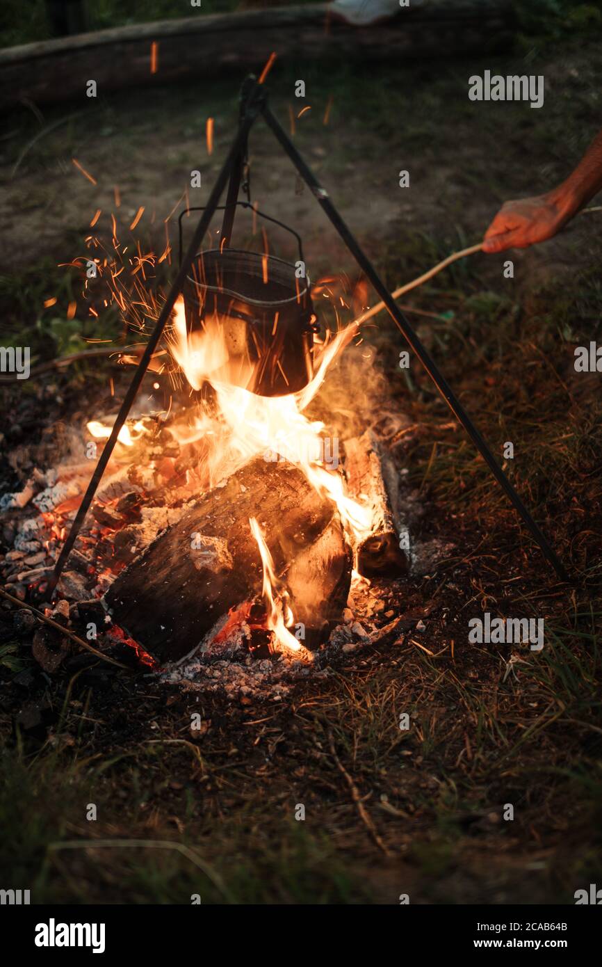 the light of the campfire. blazing bonfire at night Stock Photo - Alamy