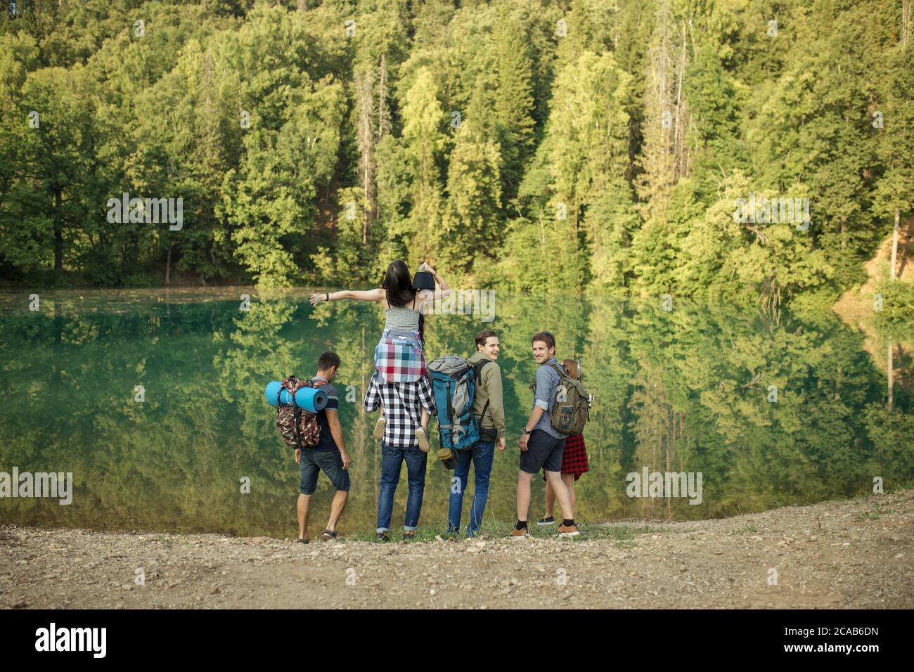 back view photo. young motivated explorers spending summer holidays in ...