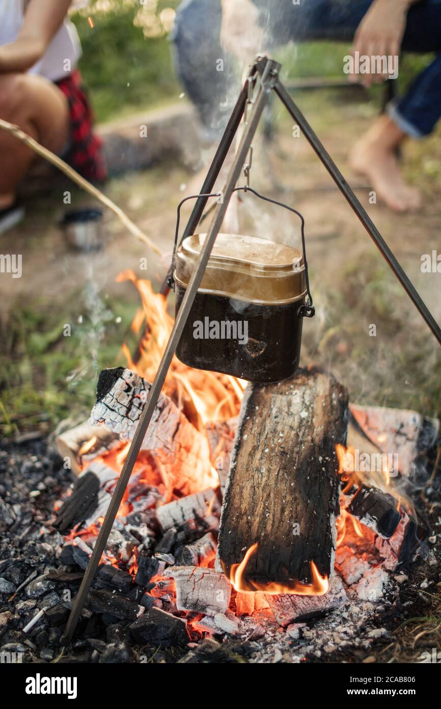 travelers have made light campfire for getting dinner ready Stock Photo ...