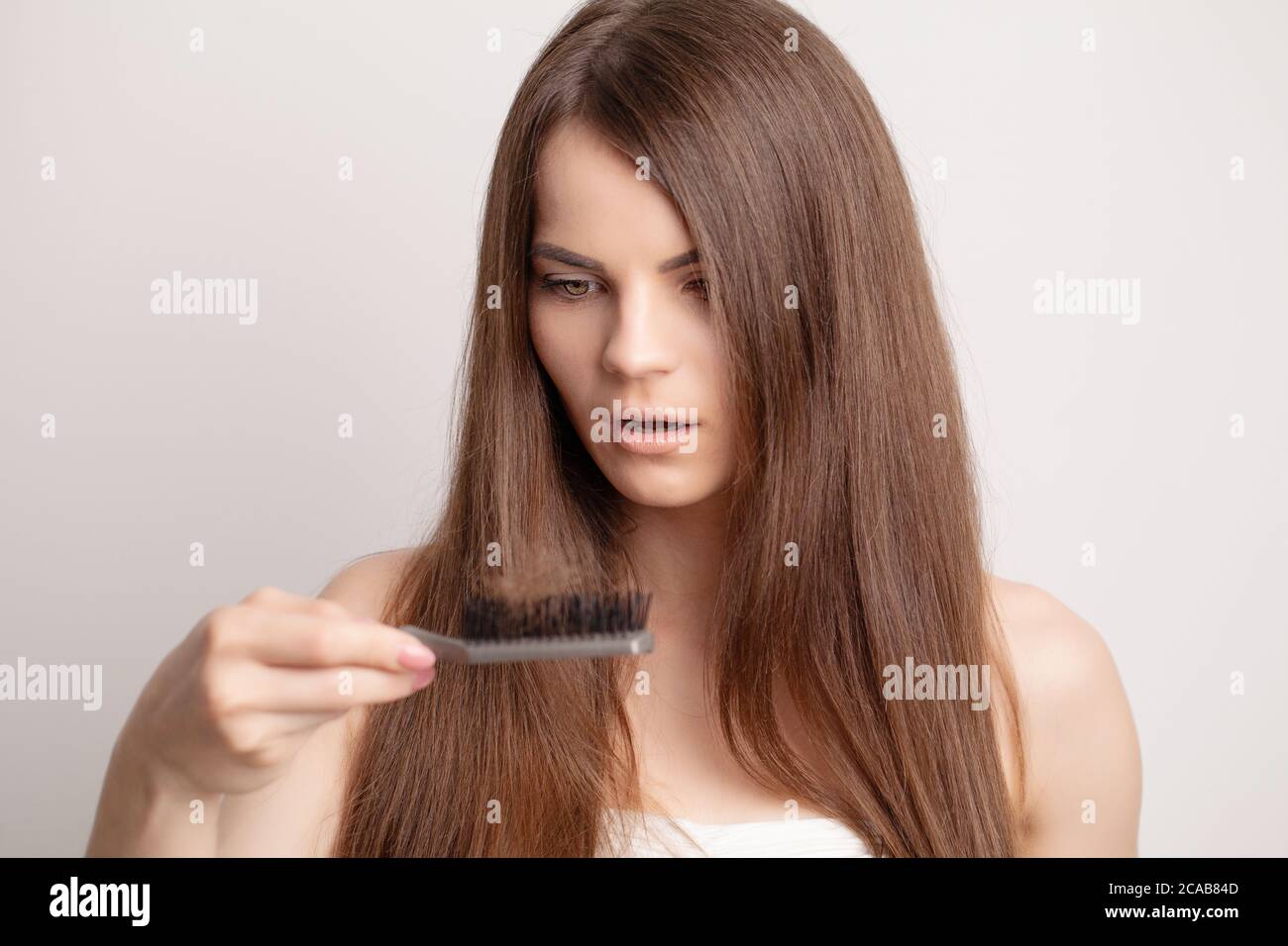 Stuck hair comb hi-res stock photography and images - Alamy