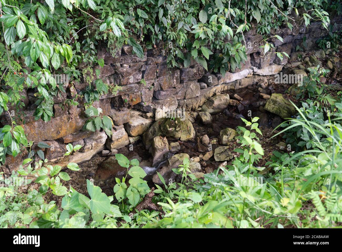 The aqueduct for the Otolum Creek in the ruins of the Mayan city of ...