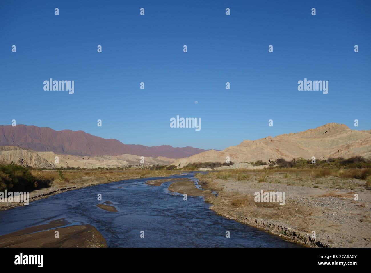 Beautiful scenery of a big river in a dry mountain landscape under the ...