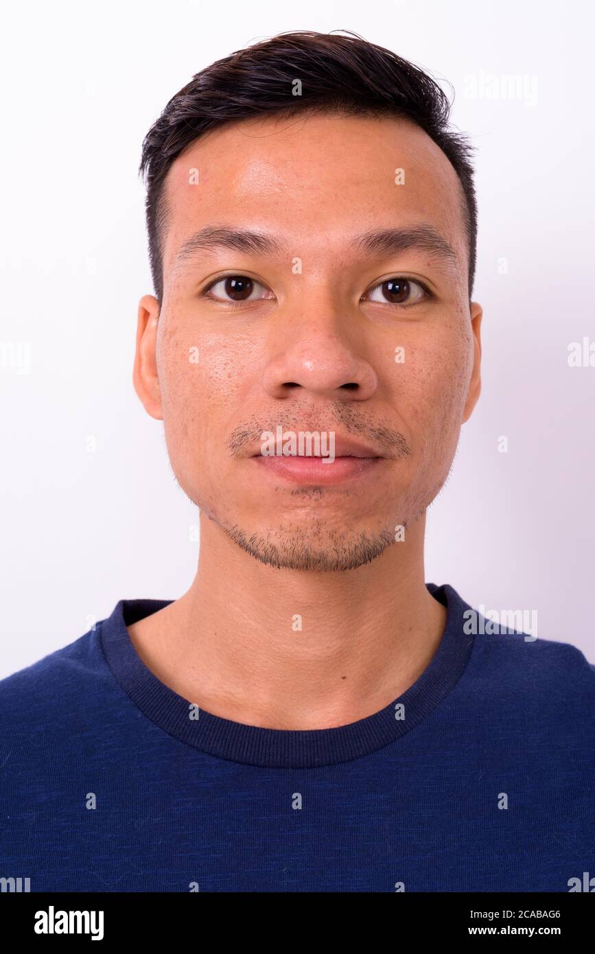Portrait of young Asian man with beard stubble Stock Photo - Alamy