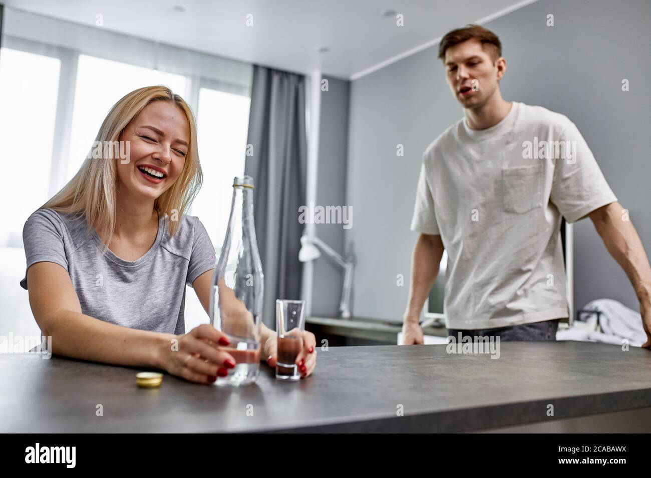 husband dissatisfied with his wife an alcoholic, angry man look at ...