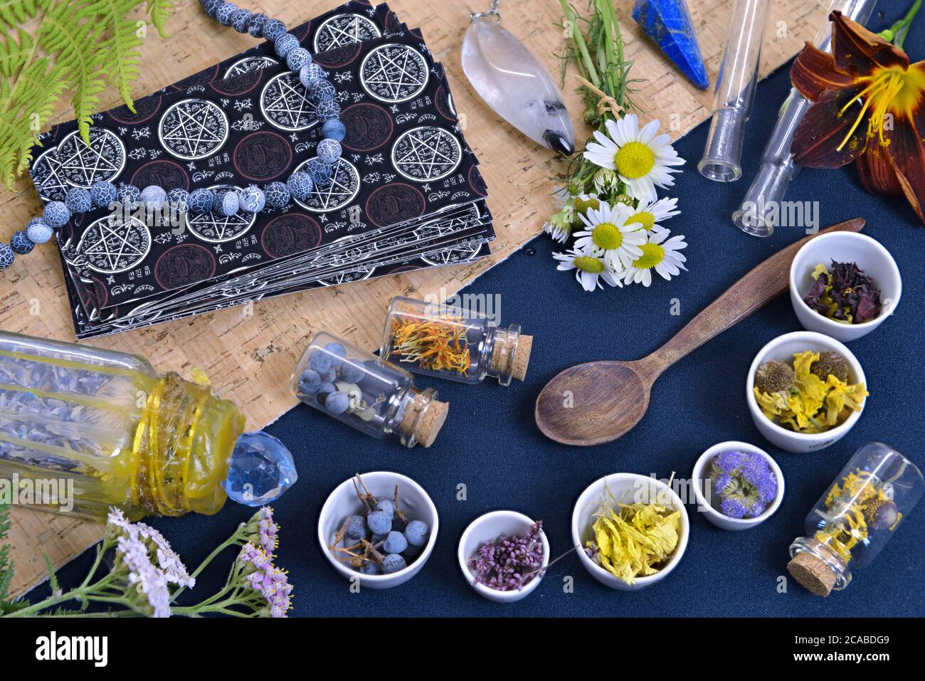 Mystic still life with tarot cards, elixir bottle and ingredient for ...
