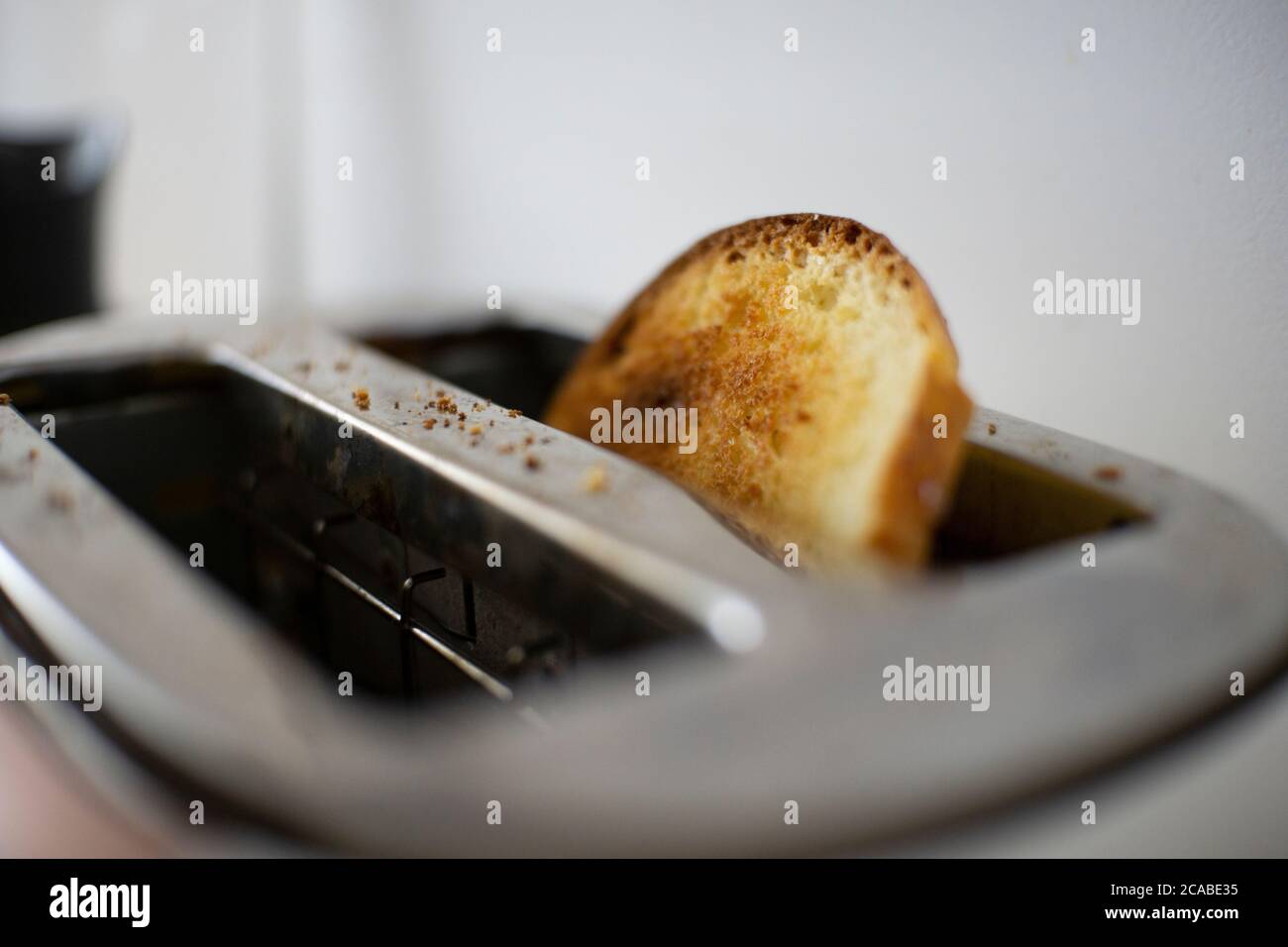 slice of bread in toaster Stock Photo - Alamy