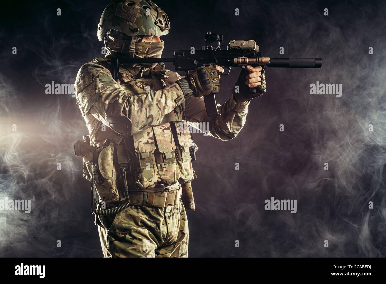 special forces soldier man holding machine gun and military equipment ...