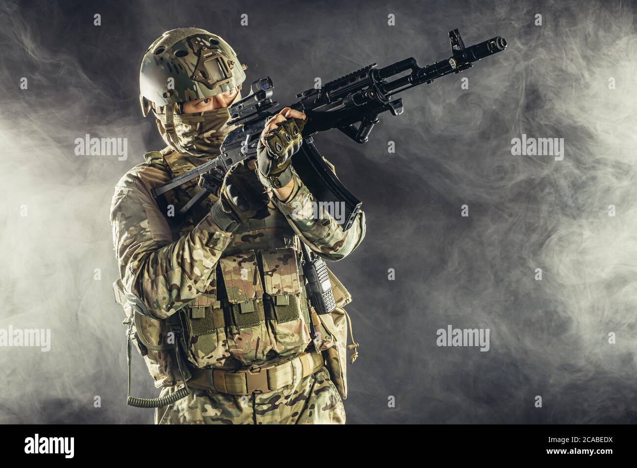 special forces soldier man holding machine gun and military equipment ...