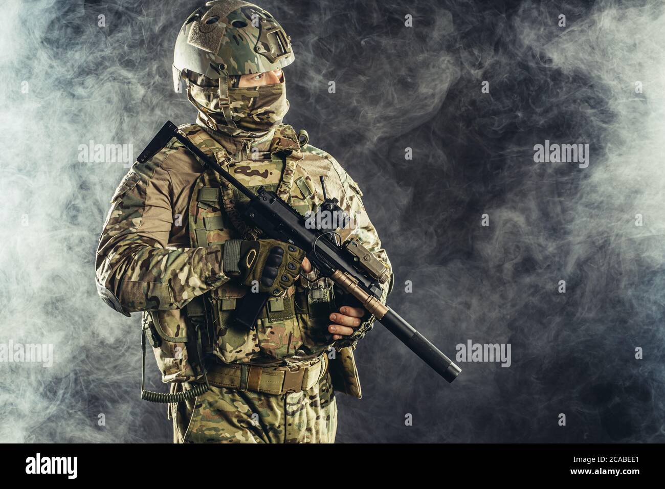 special forces soldier man holding machine gun and military equipment ...
